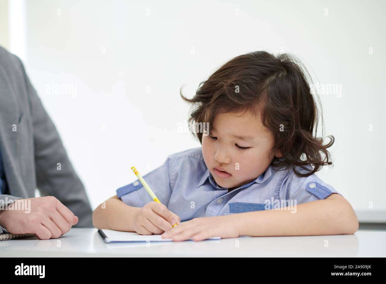 Japanese elementary school kid with teacher Stock Photo - Alamy