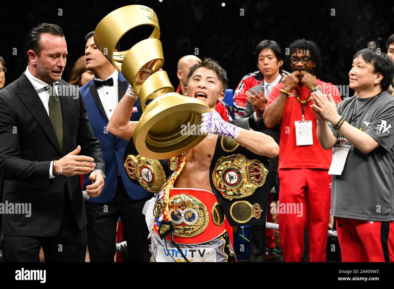 Naoya Inoue of Japan celebrates with the Muhammad Ali Trophy after ...