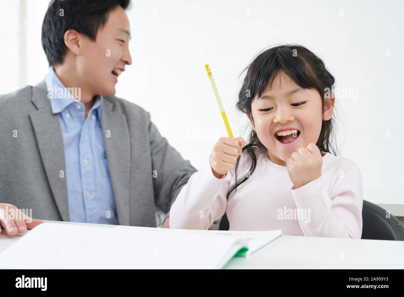 Japanese elementary school kid with teacher Stock Photo - Alamy