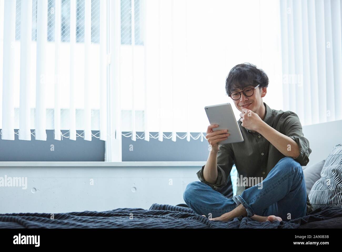 Young Japanese man portrait Stock Photo - Alamy
