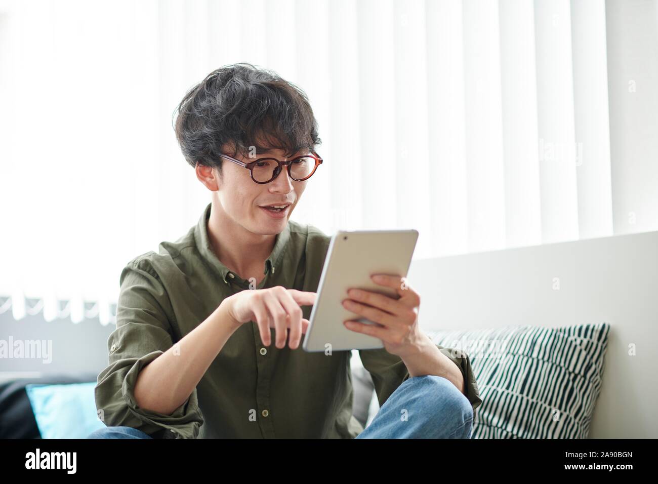 Young Japanese man portrait Stock Photo - Alamy