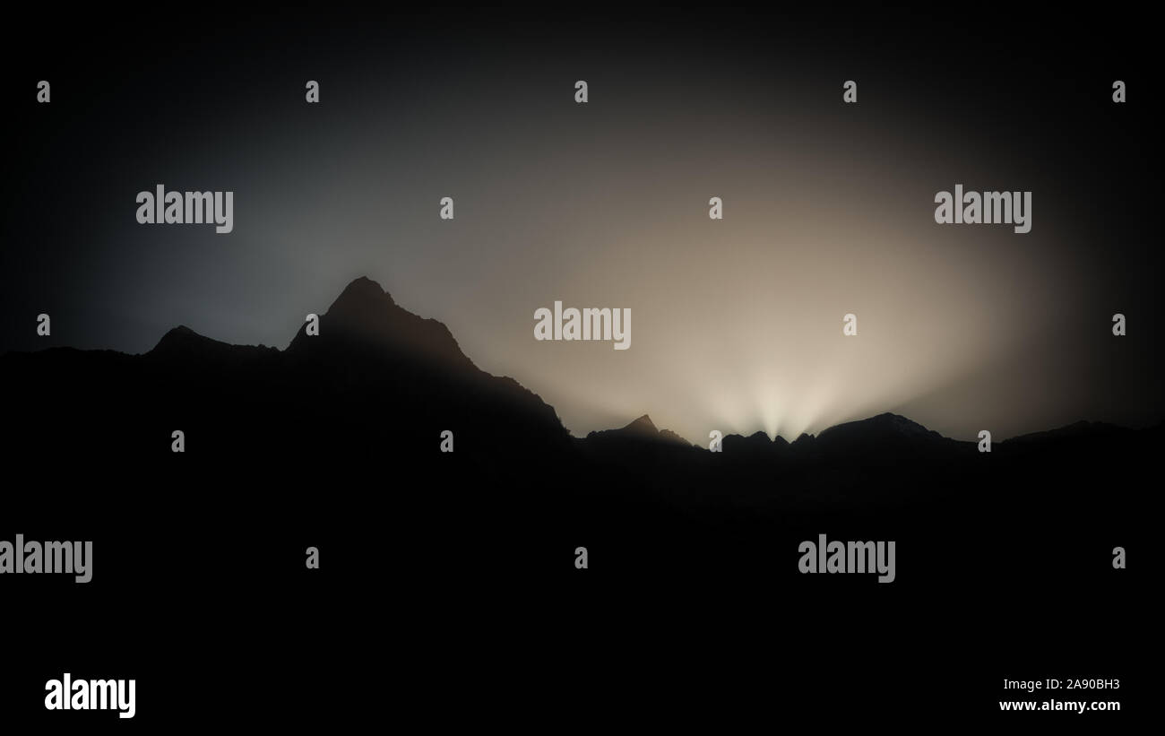 dark sunset in the mountain Stock Photo - Alamy