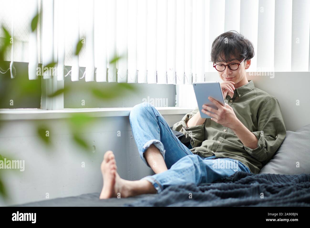 Young Japanese man portrait Stock Photo - Alamy