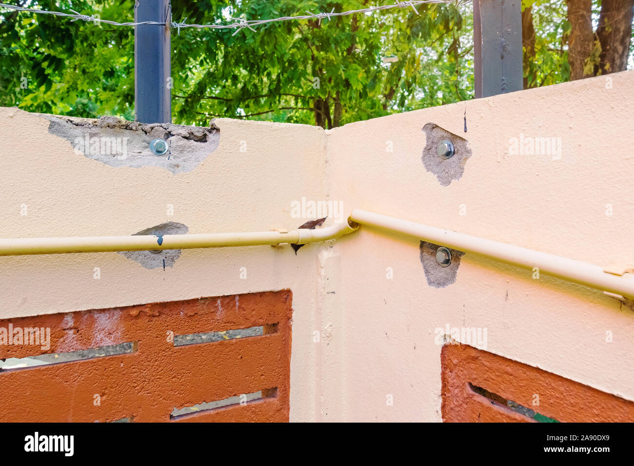 Broken on concrete walls after drilling and fixing bolt with nut and ...