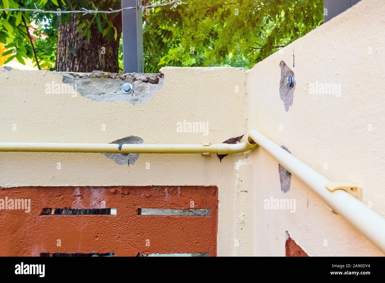 Broken on concrete walls after drilling and fixing bolt with nut and ...