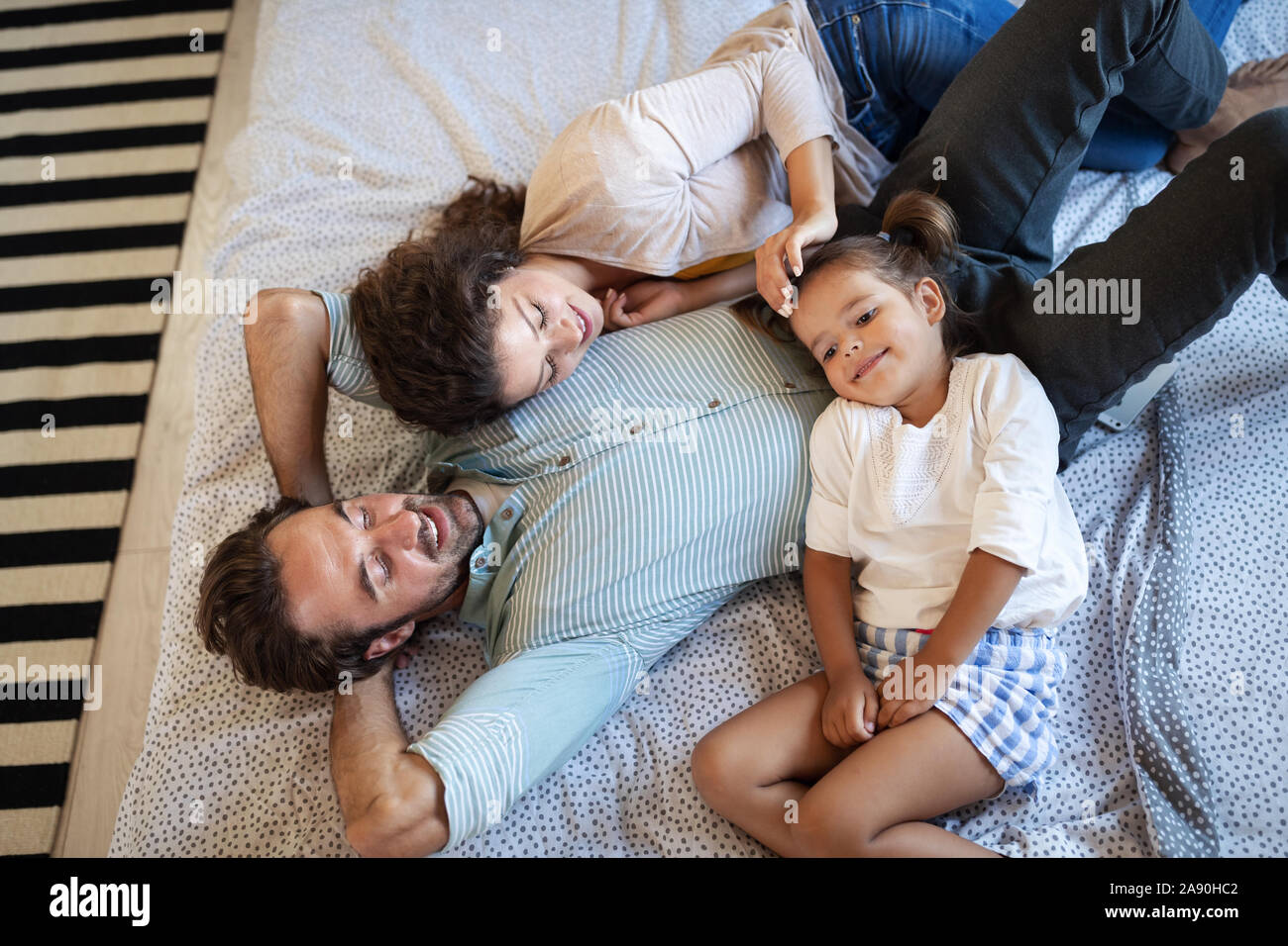 Happy family having fun time at home Stock Photo - Alamy