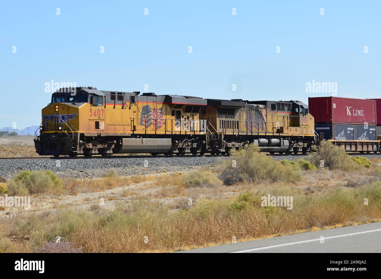 General Electric ET44AH locomotive pulling a freight train Stock Photo ...