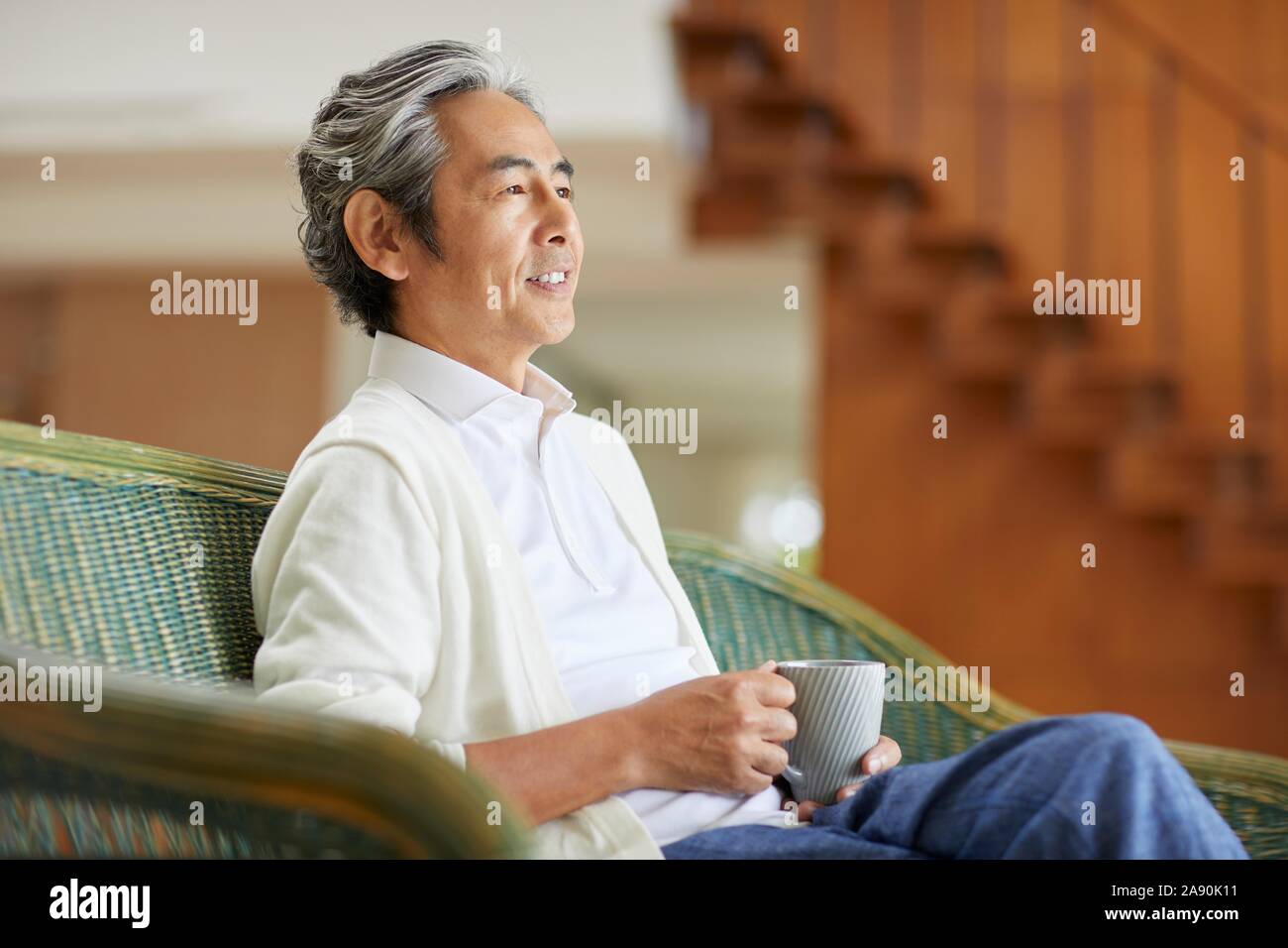 Senior Japanese man at home Stock Photo - Alamy