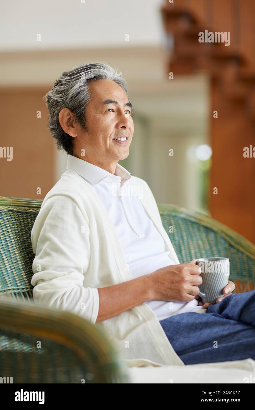 Senior Japanese man at home Stock Photo - Alamy