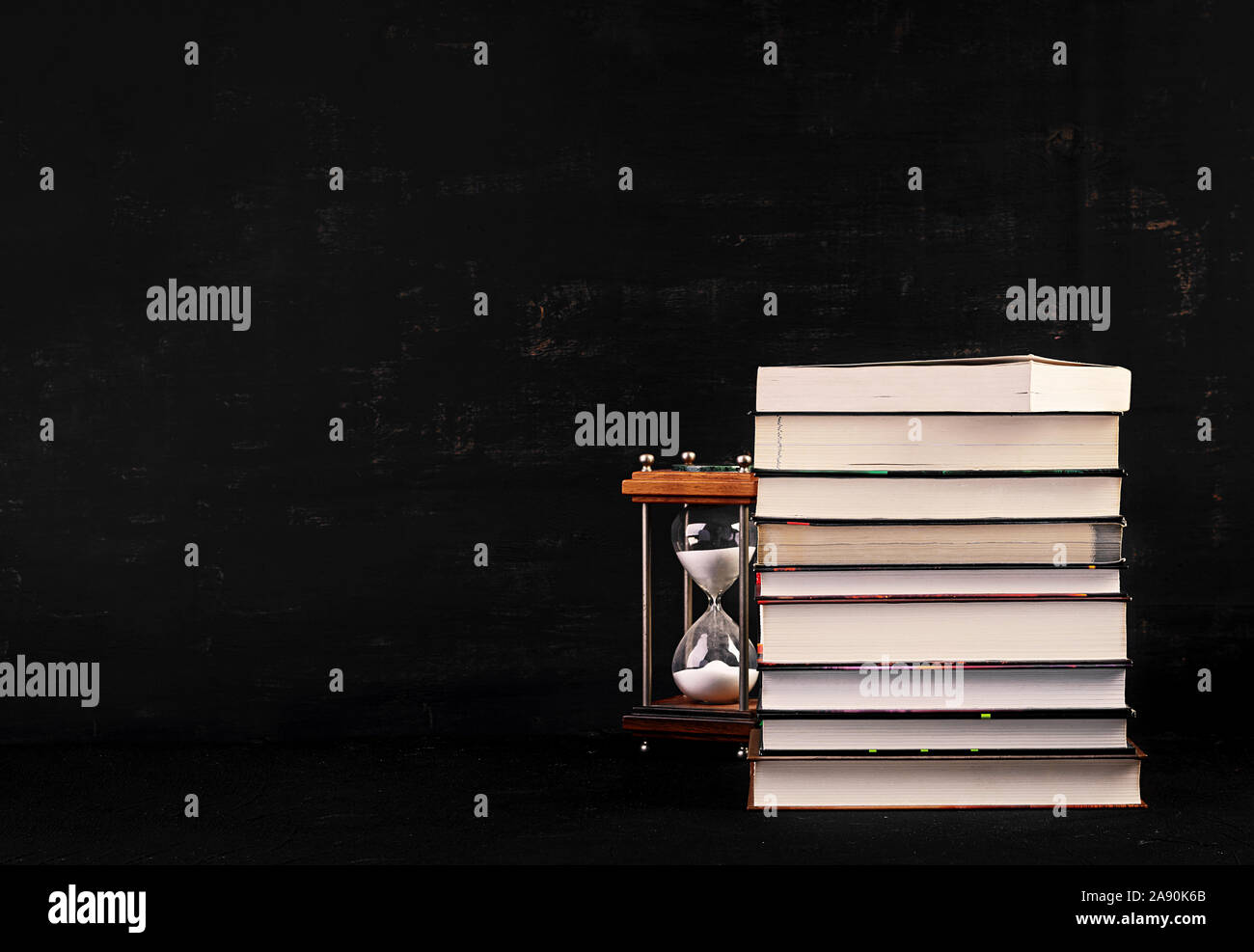Stack of different books on dark background. Knowledge concept Stock ...