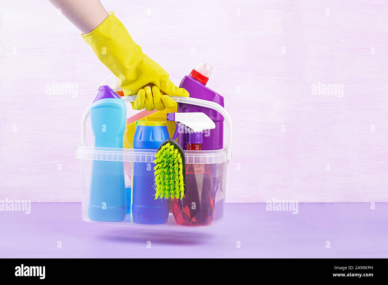 Cleaning service concept. Colorful cleaning set for different surfaces ...