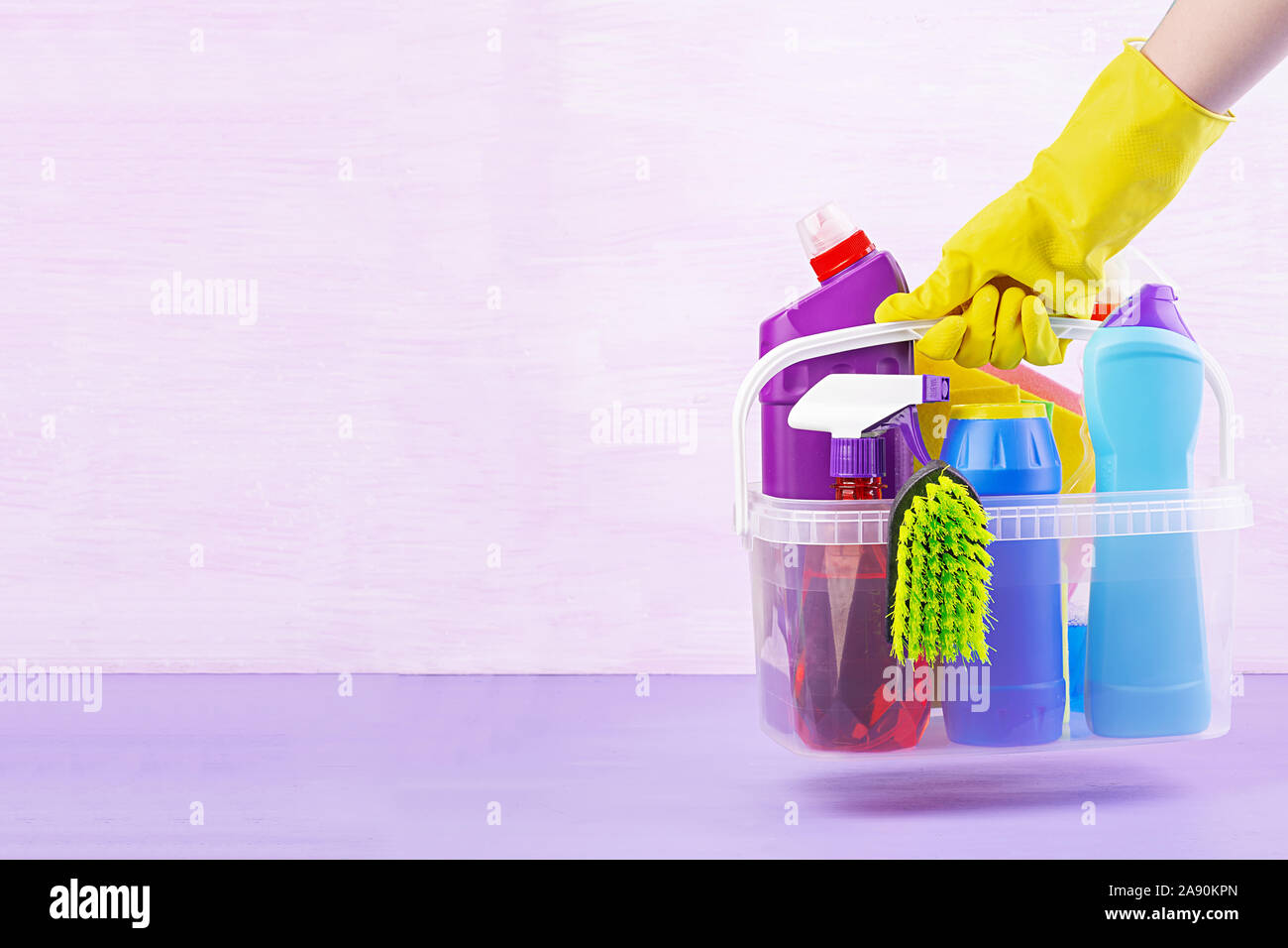 Cleaning service concept. Colorful cleaning set for different surfaces ...