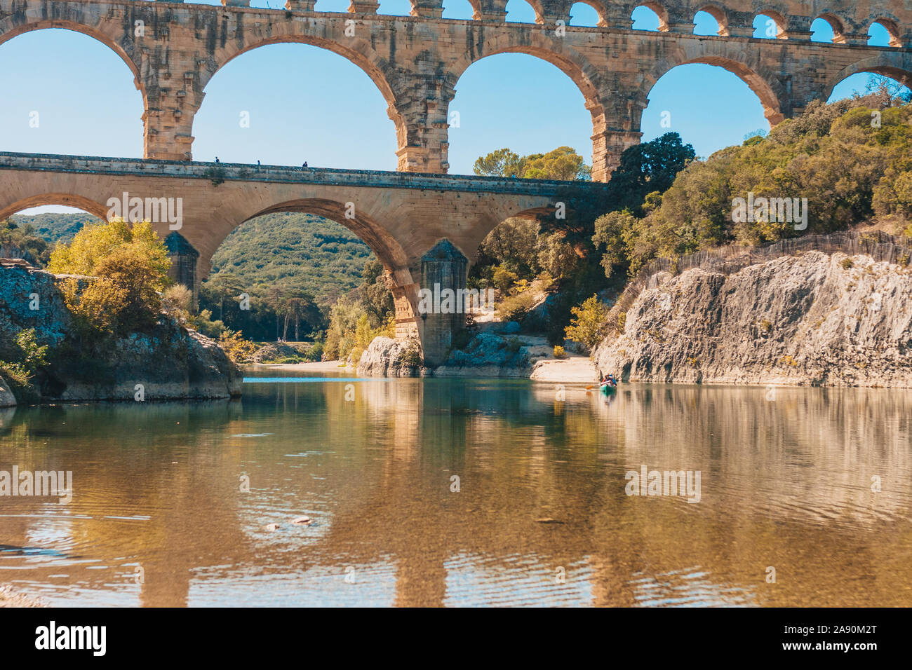 Beautiful view of the ancient Roman bridge Pont du Gard from the middle ...