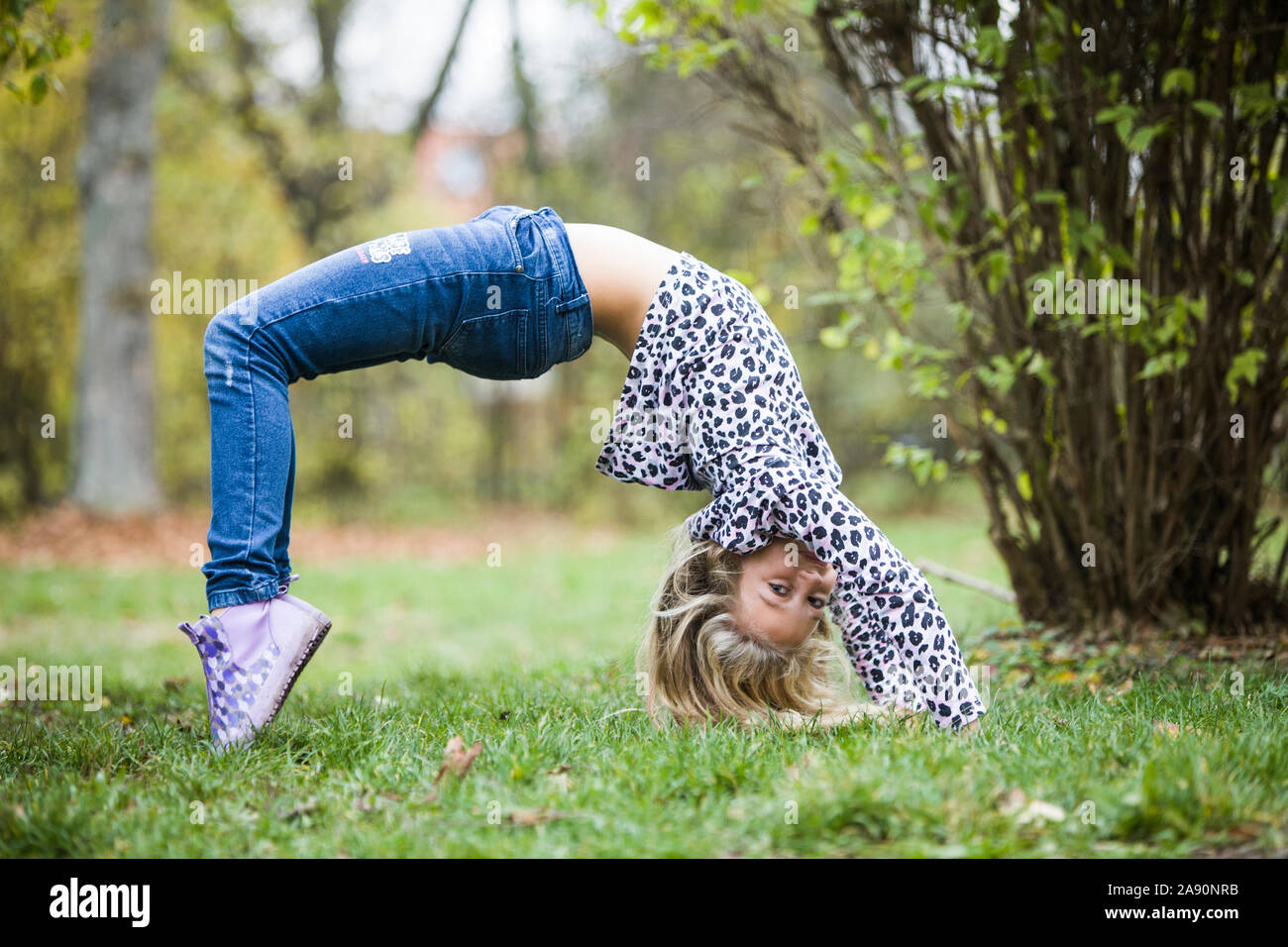 Blonde girl doing fashion pose hi-res stock photography and images - Alamy