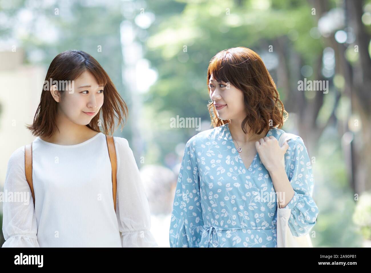 Young Japanese friends having fun together Stock Photo - Alamy