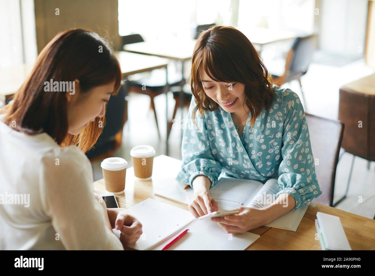 Young Japanese friends having fun together Stock Photo - Alamy