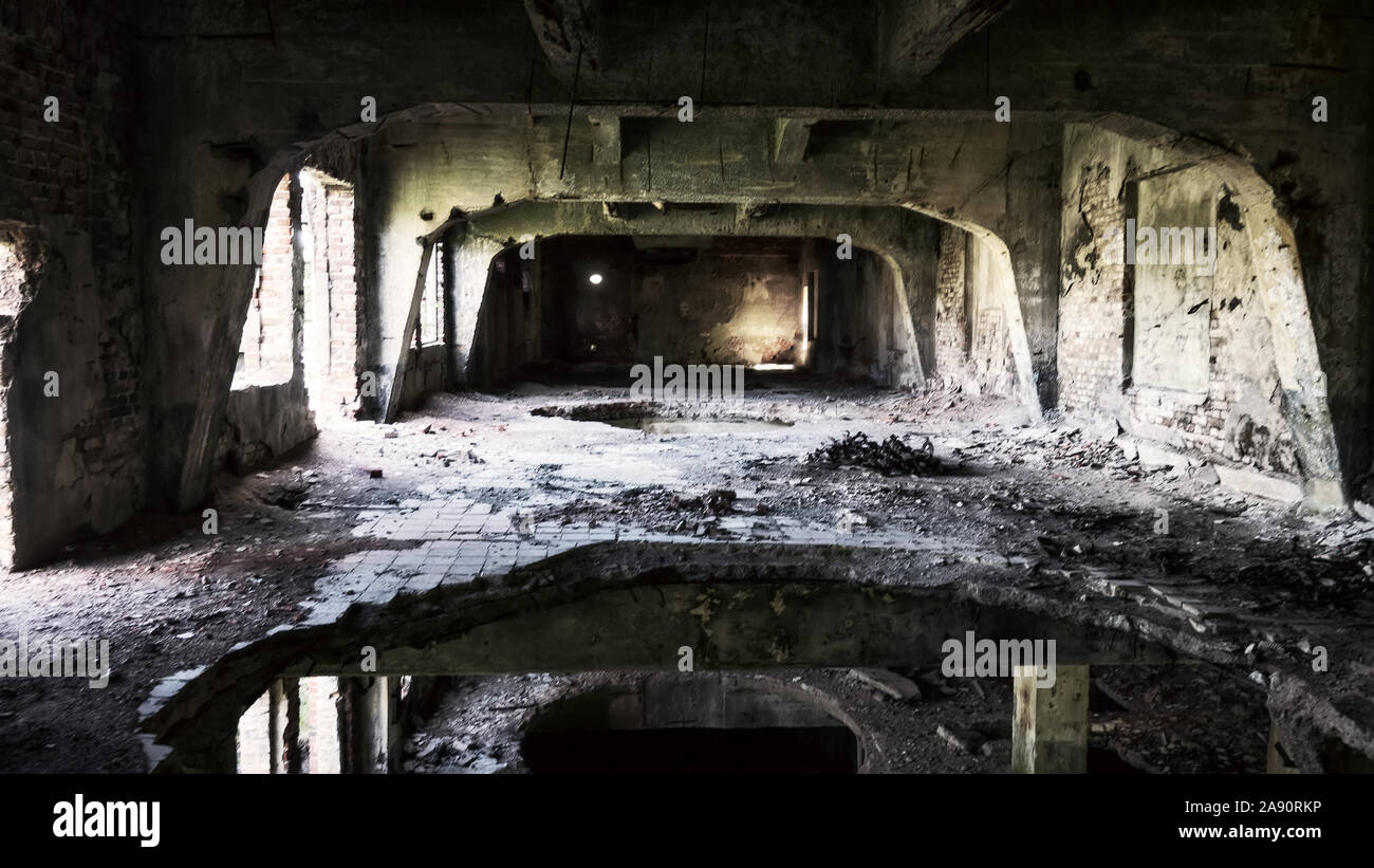 Long-abandoned factory with falling bricks and huge failures. Dangerous ...