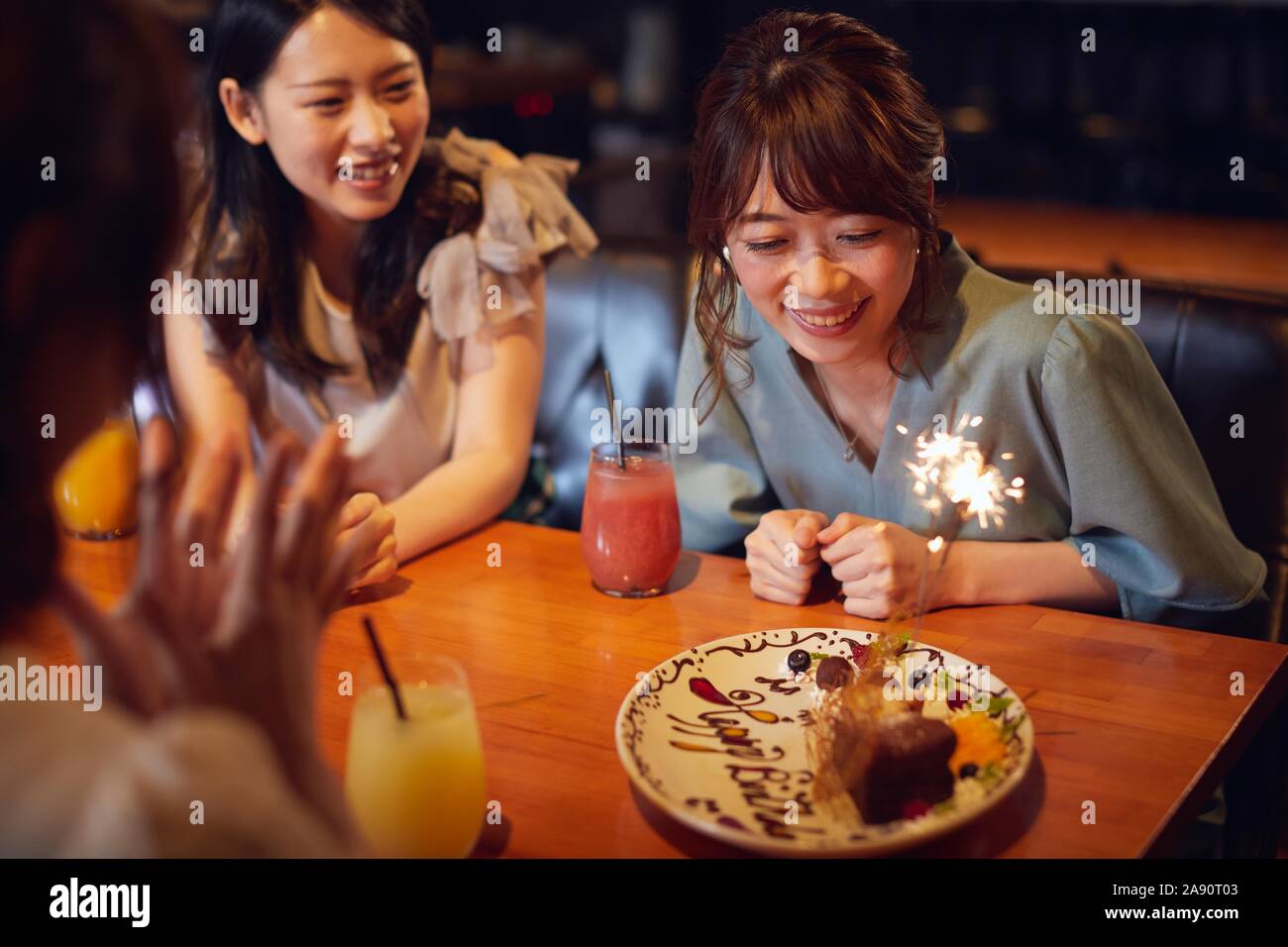 Young Japanese friends having fun together Stock Photo - Alamy