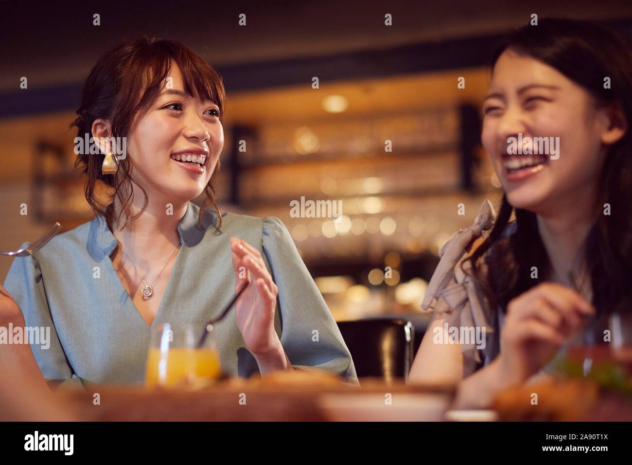 Young Japanese friends having fun together Stock Photo - Alamy