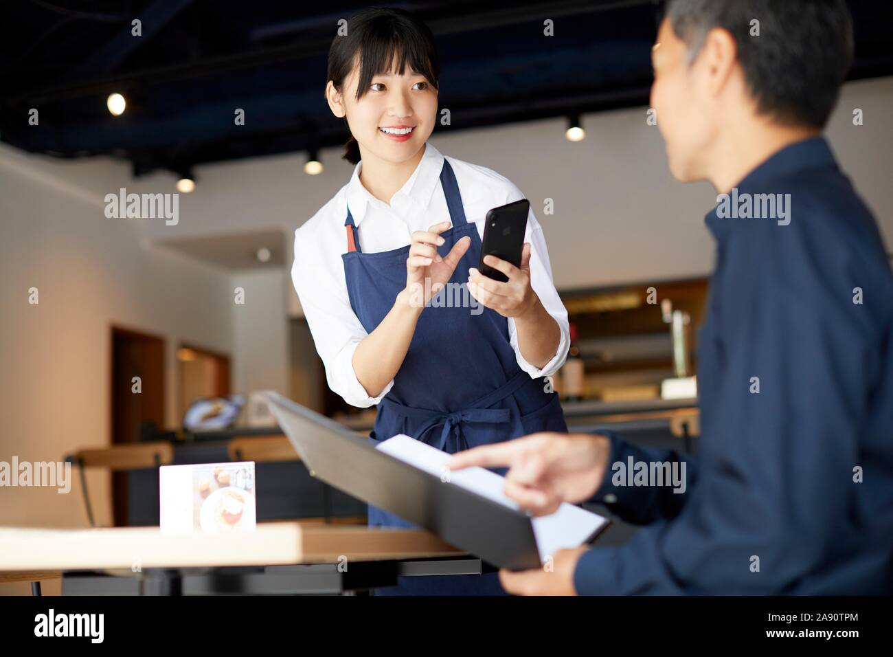 People ordering food japanese restaurant hi-res stock photography and ...