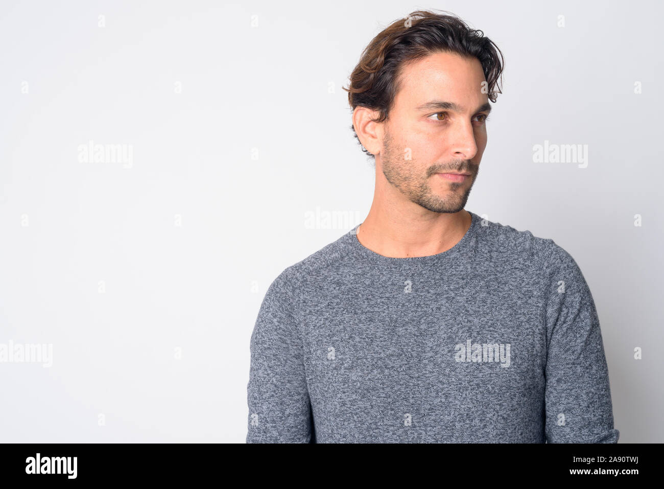Face of handsome Hispanic man looking away Stock Photo - Alamy