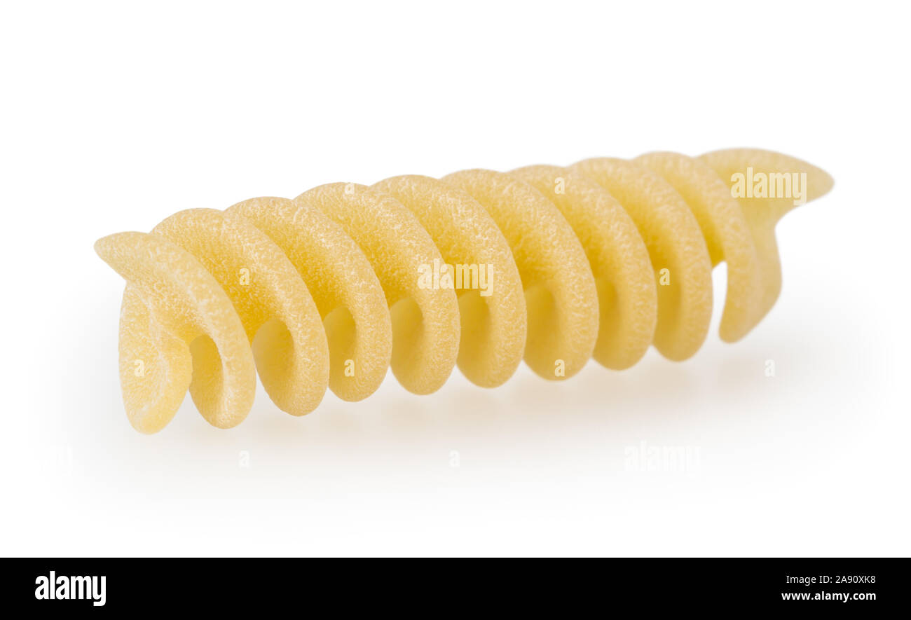 Uncooked fusilli pasta isolated on white background with clipping path ...