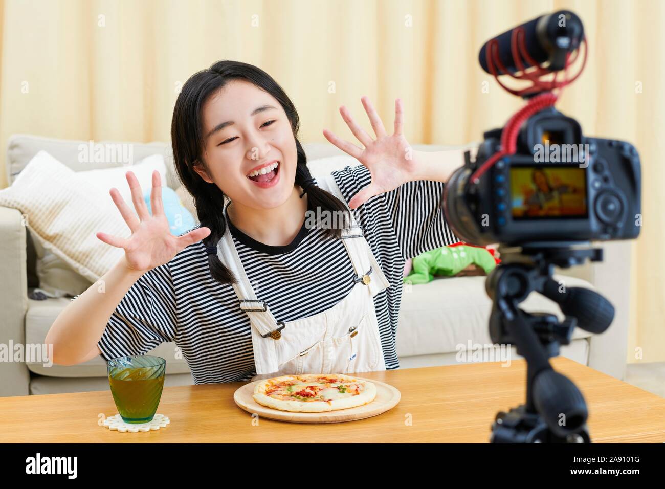 Young Japanese youtuber streaming at home Stock Photo - Alamy