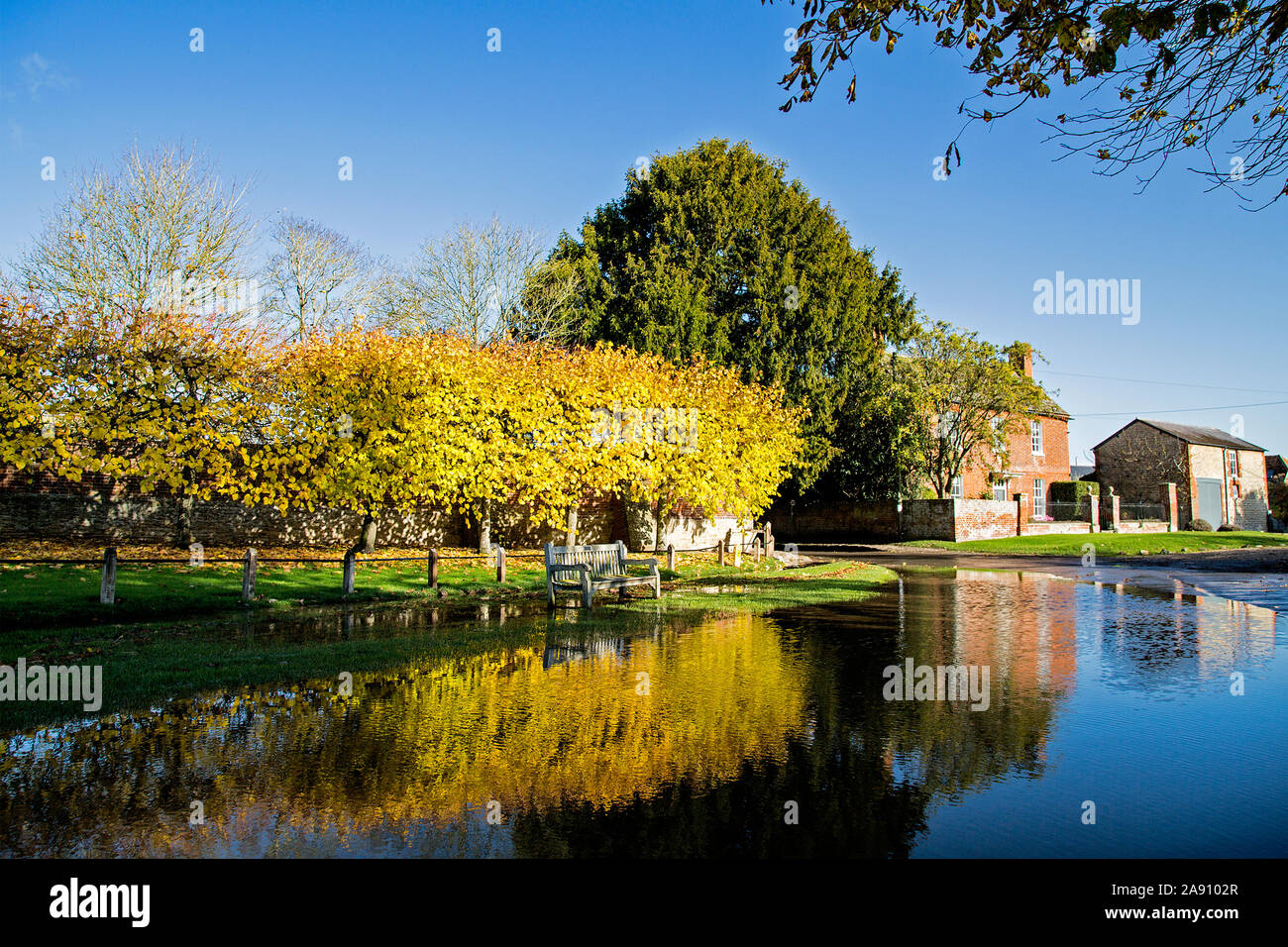 A flooded Church Street, West Hanney, Wantage, Oxfordshire, England, UK ...
