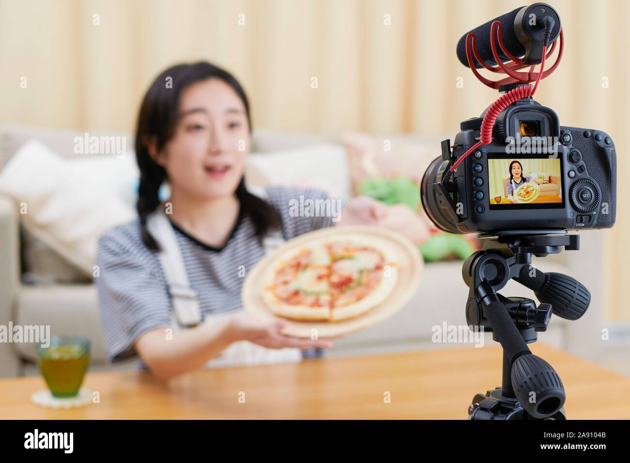 Young Japanese youtuber streaming at home Stock Photo - Alamy