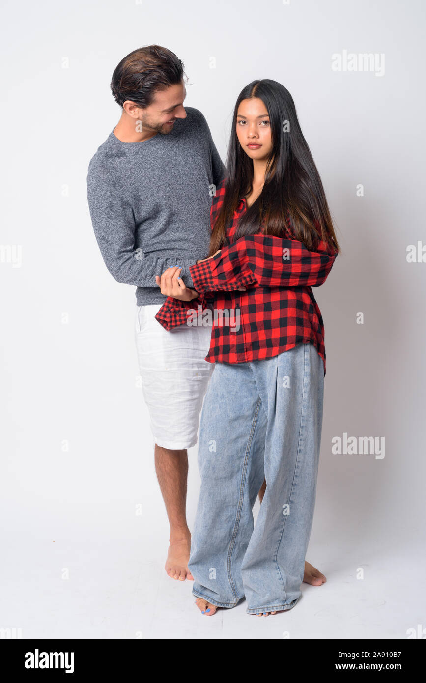 Full body shot of happy multi ethnic couple together and in love Stock ...