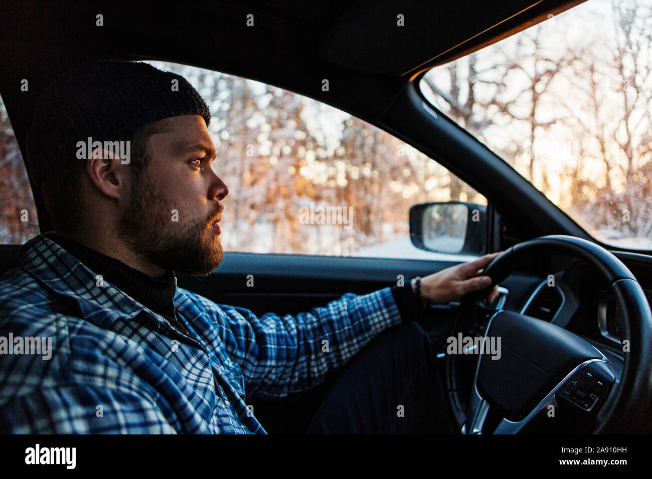 Man driving car Stock Photo - Alamy