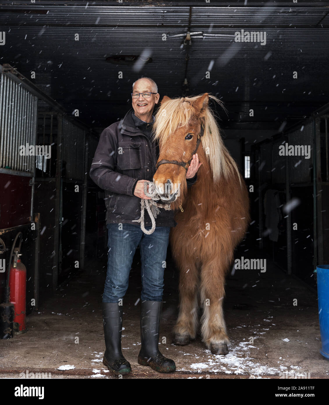 Senior man with pony Stock Photo - Alamy