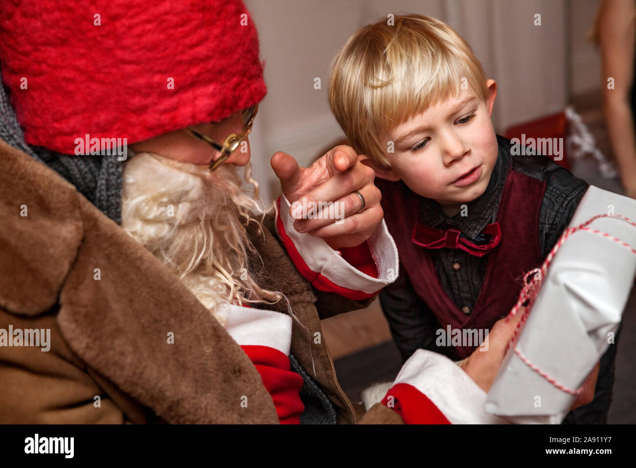 Boy meeting Santa Stock Photo - Alamy