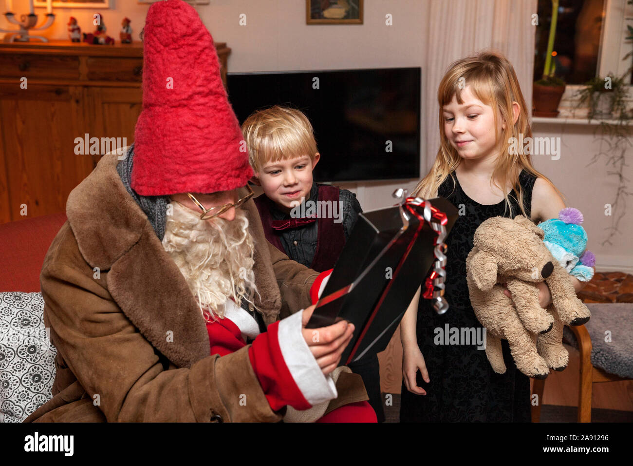 Children meeting Santa Stock Photo - Alamy