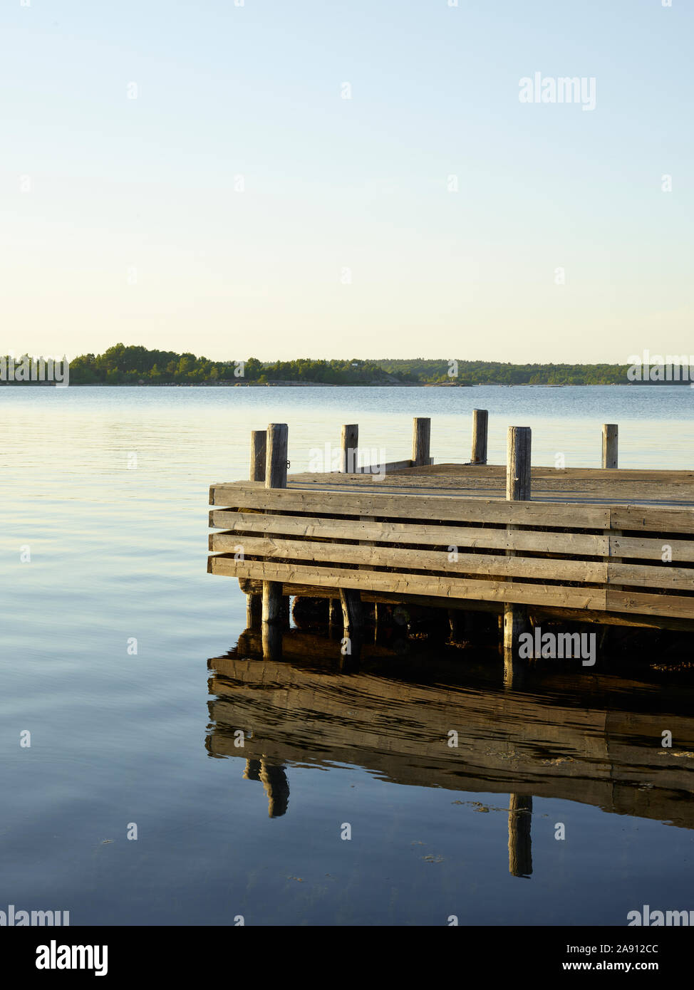 Wooden jetty at lake Stock Photo - Alamy