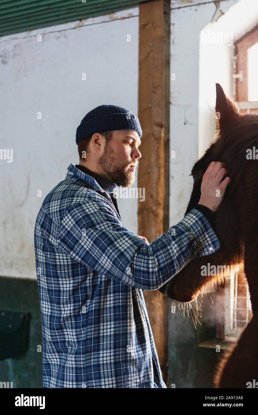 Man and animals working together hi-res stock photography and images ...