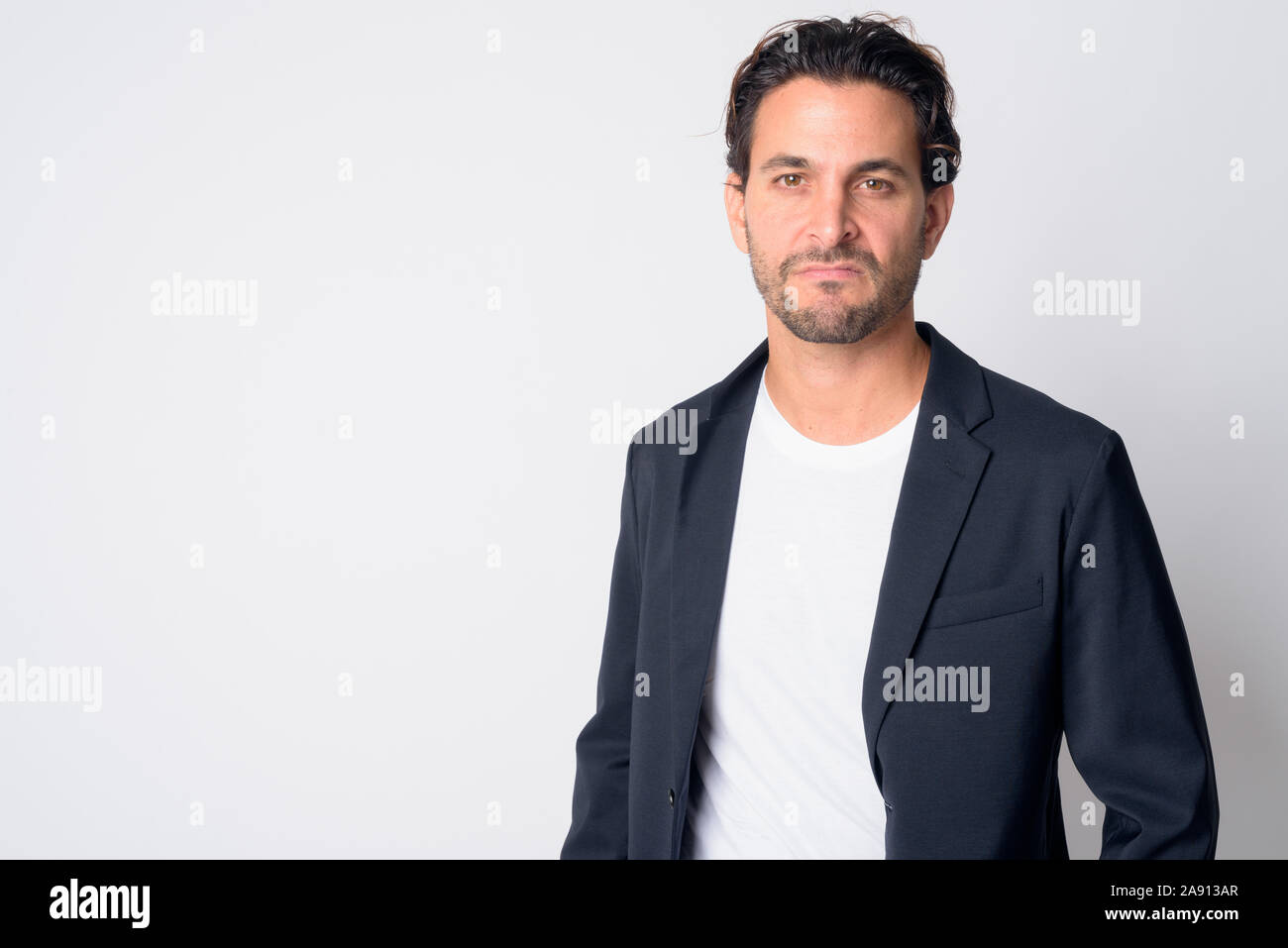 Portrait of stressed Hispanic businessman looking angry Stock Photo - Alamy