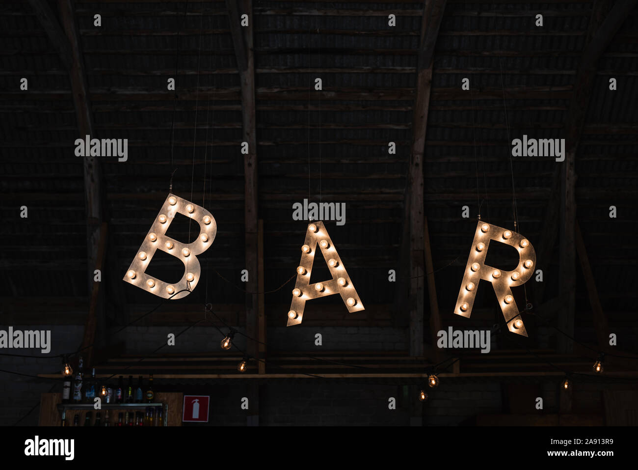 Illuminated bar sign Stock Photo - Alamy