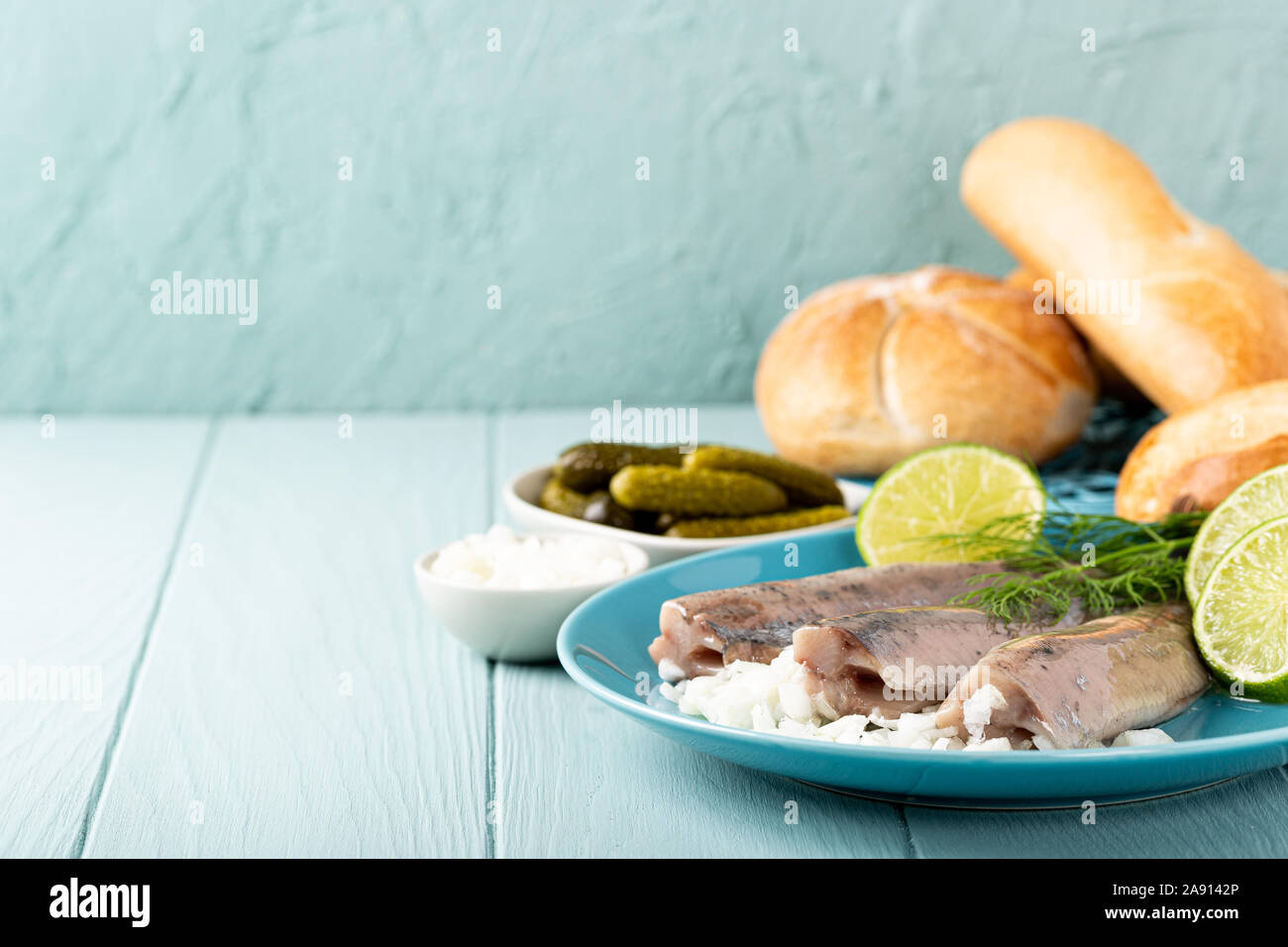 Traditional dutch food herring fish Stock Photo - Alamy