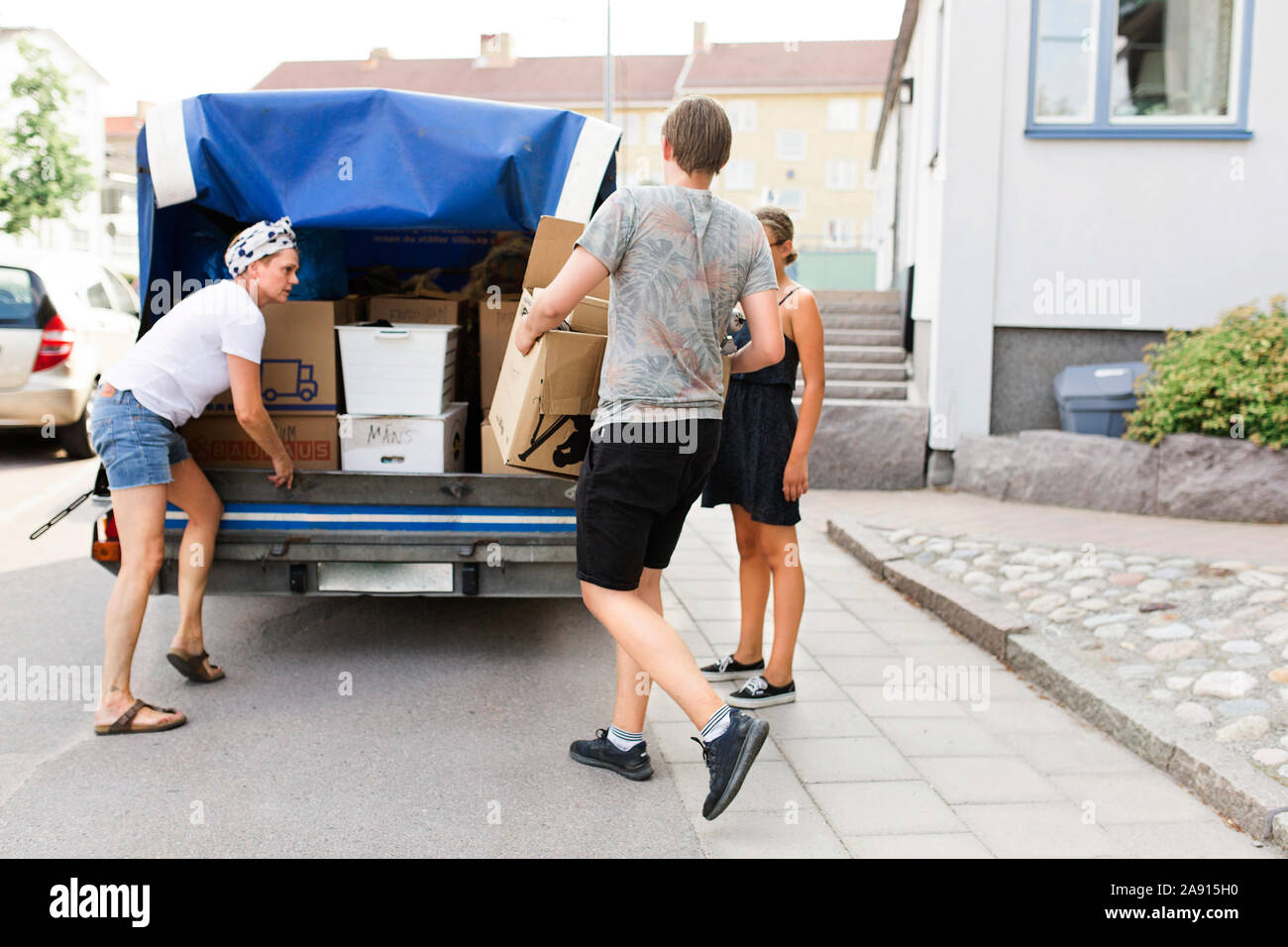 Family loading trailer Stock Photo - Alamy