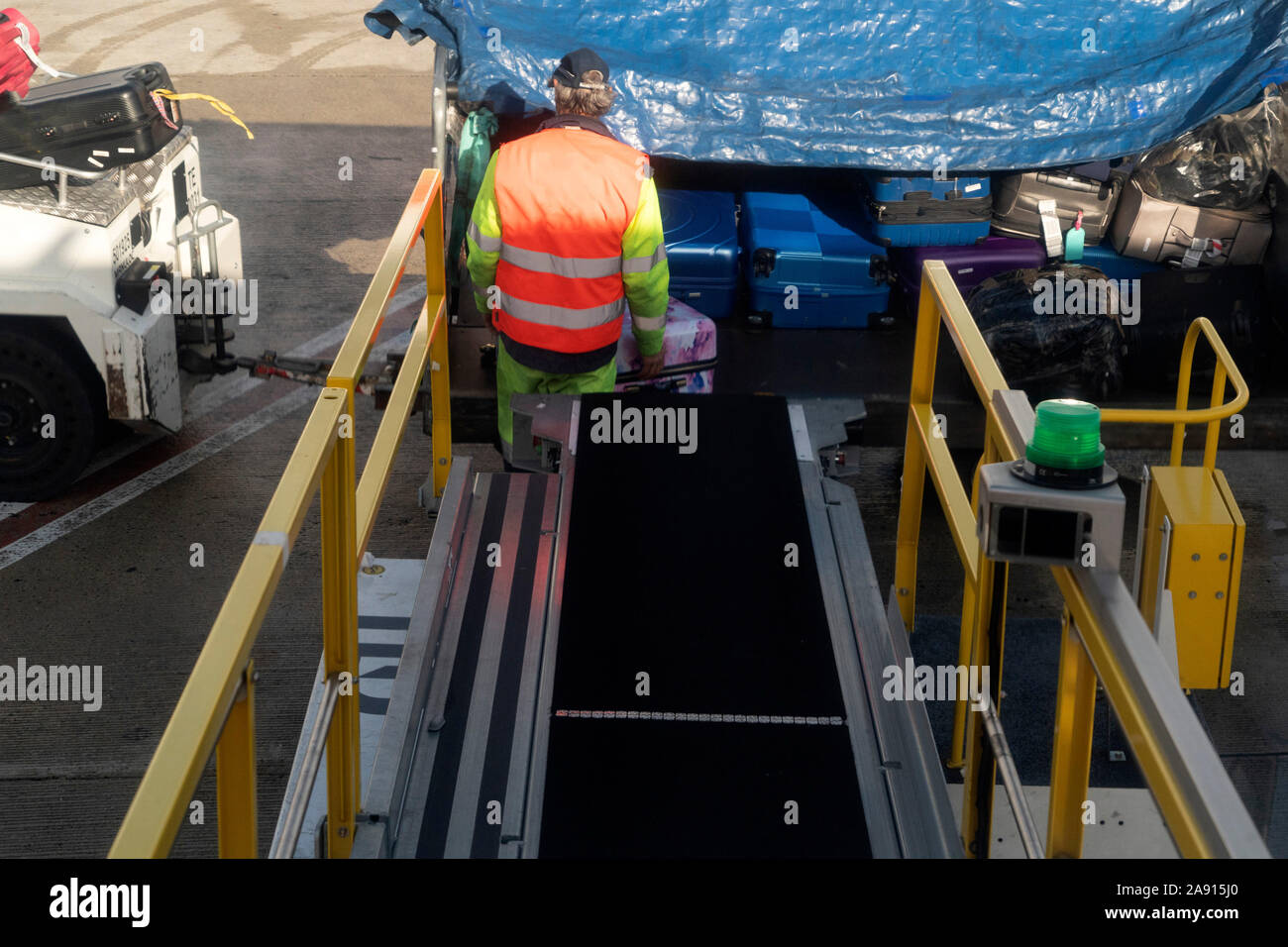 bags trolley luggage loading on airplane Stock Photo - Alamy