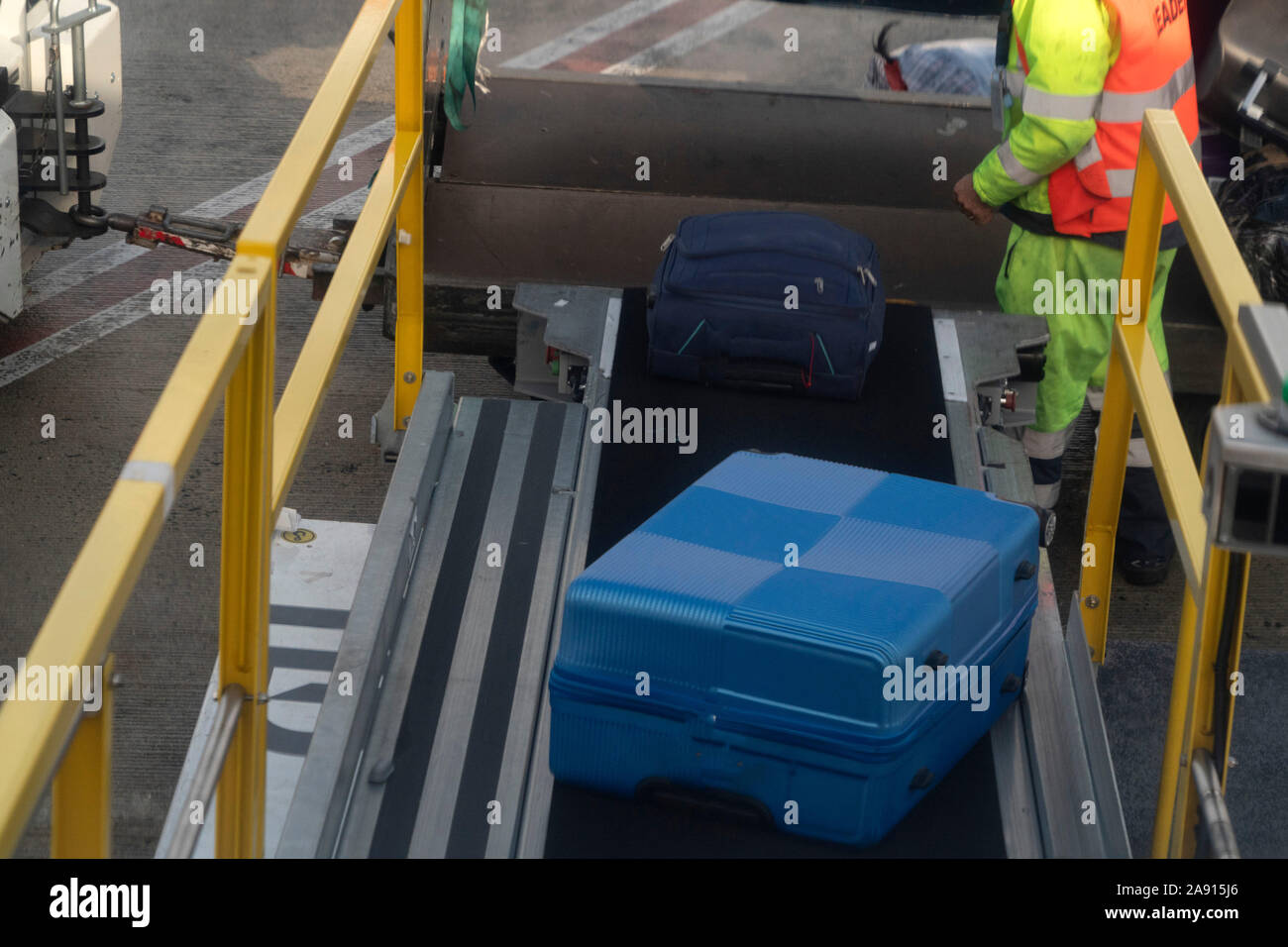 bags trolley luggage loading on airplane Stock Photo - Alamy