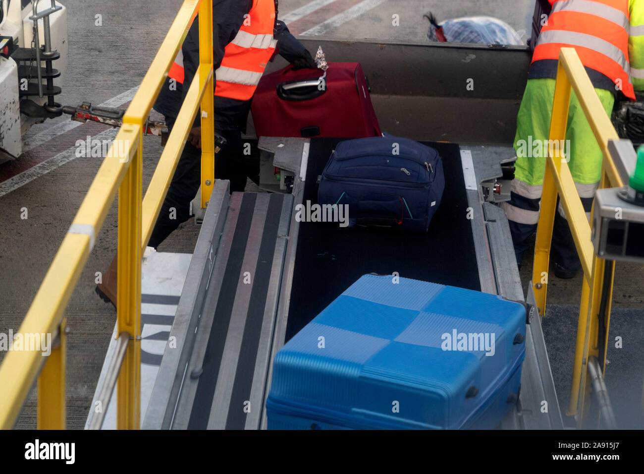 bags trolley luggage loading on airplane Stock Photo - Alamy