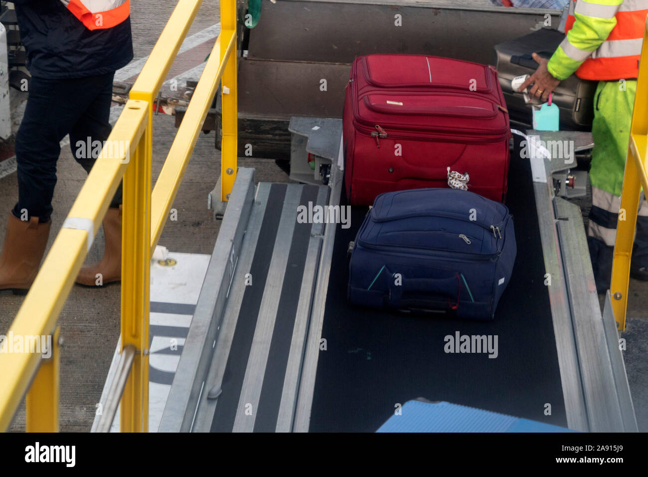 bags trolley luggage loading on airplane Stock Photo - Alamy