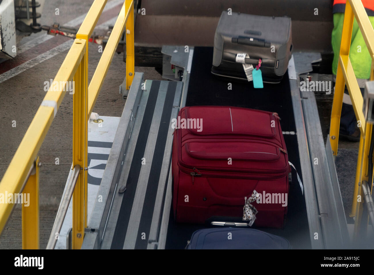 bags trolley luggage loading on airplane Stock Photo - Alamy