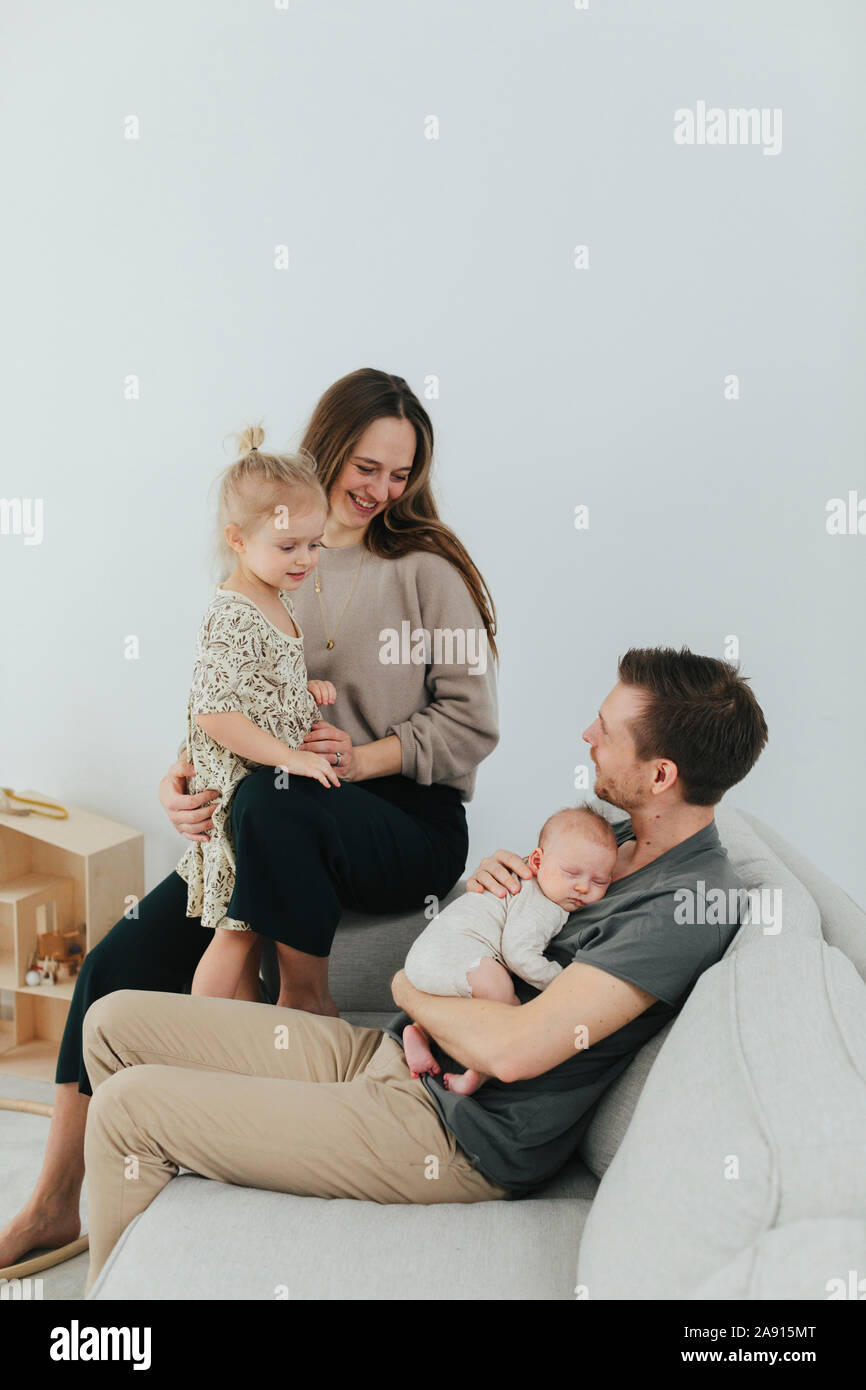 Parents with two children Stock Photo - Alamy