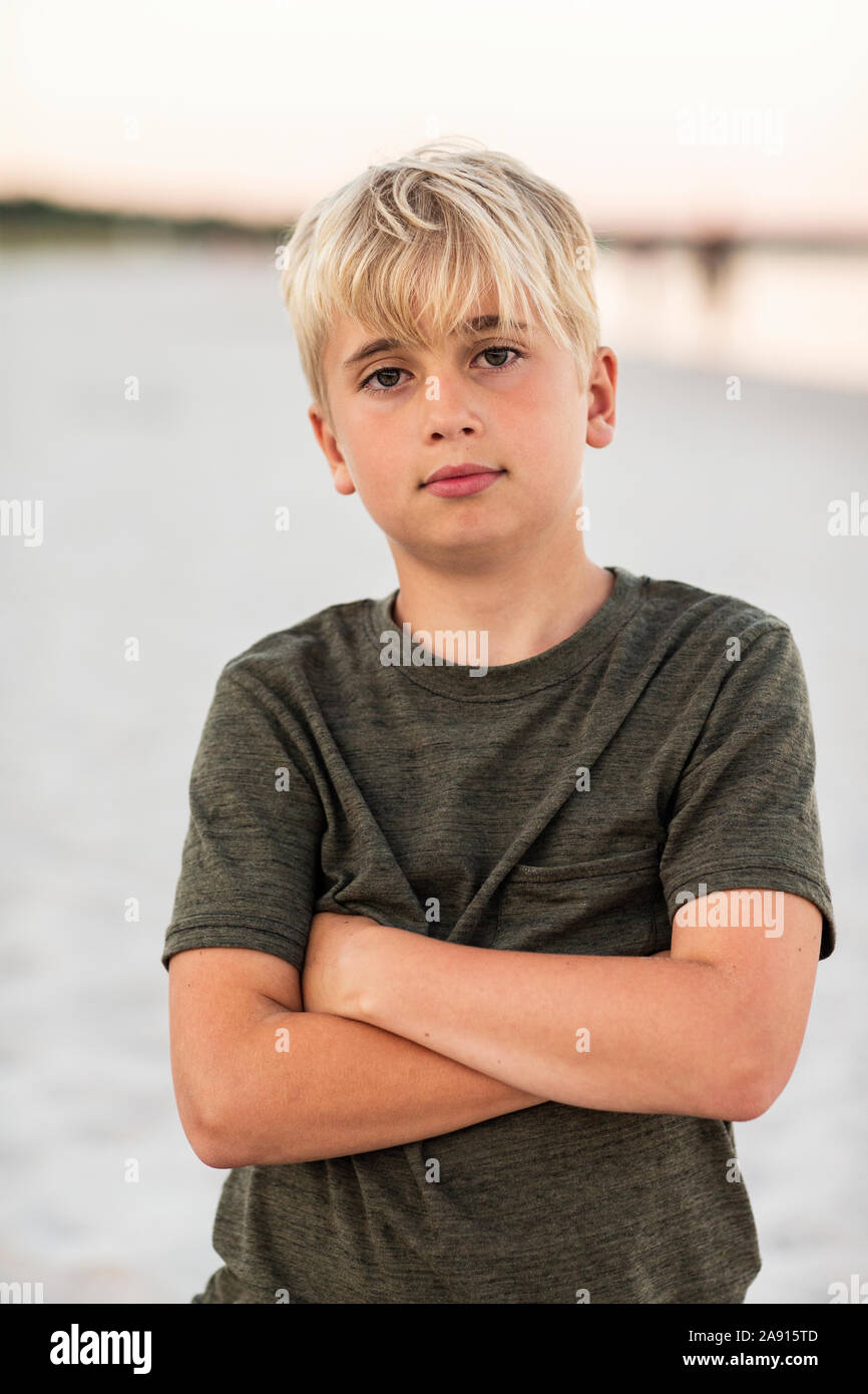 Boy looking at camera Stock Photo - Alamy