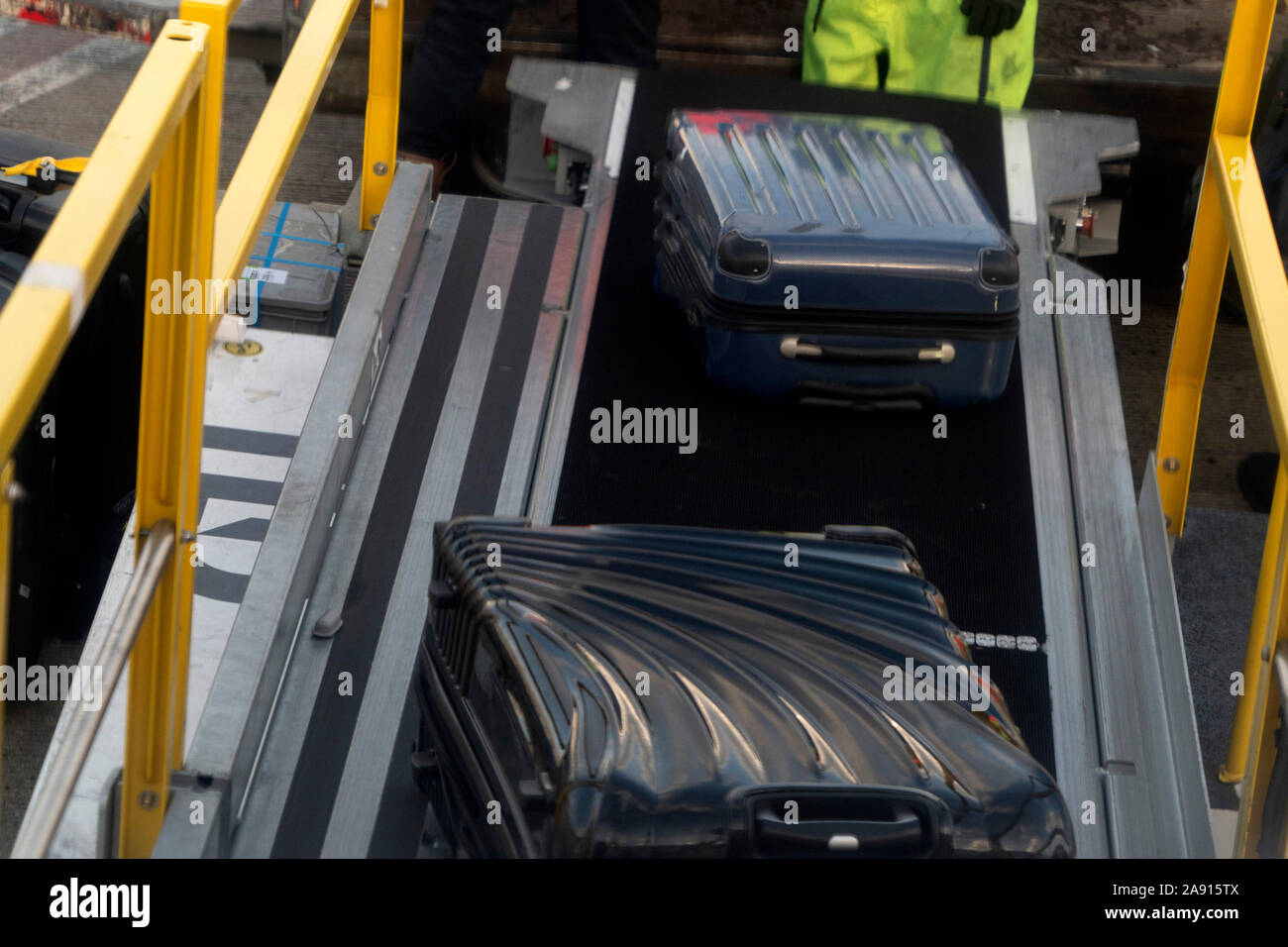 bags trolley luggage loading on airplane Stock Photo - Alamy
