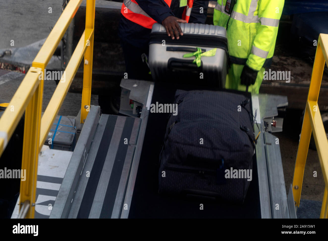 bags trolley luggage loading on airplane Stock Photo - Alamy