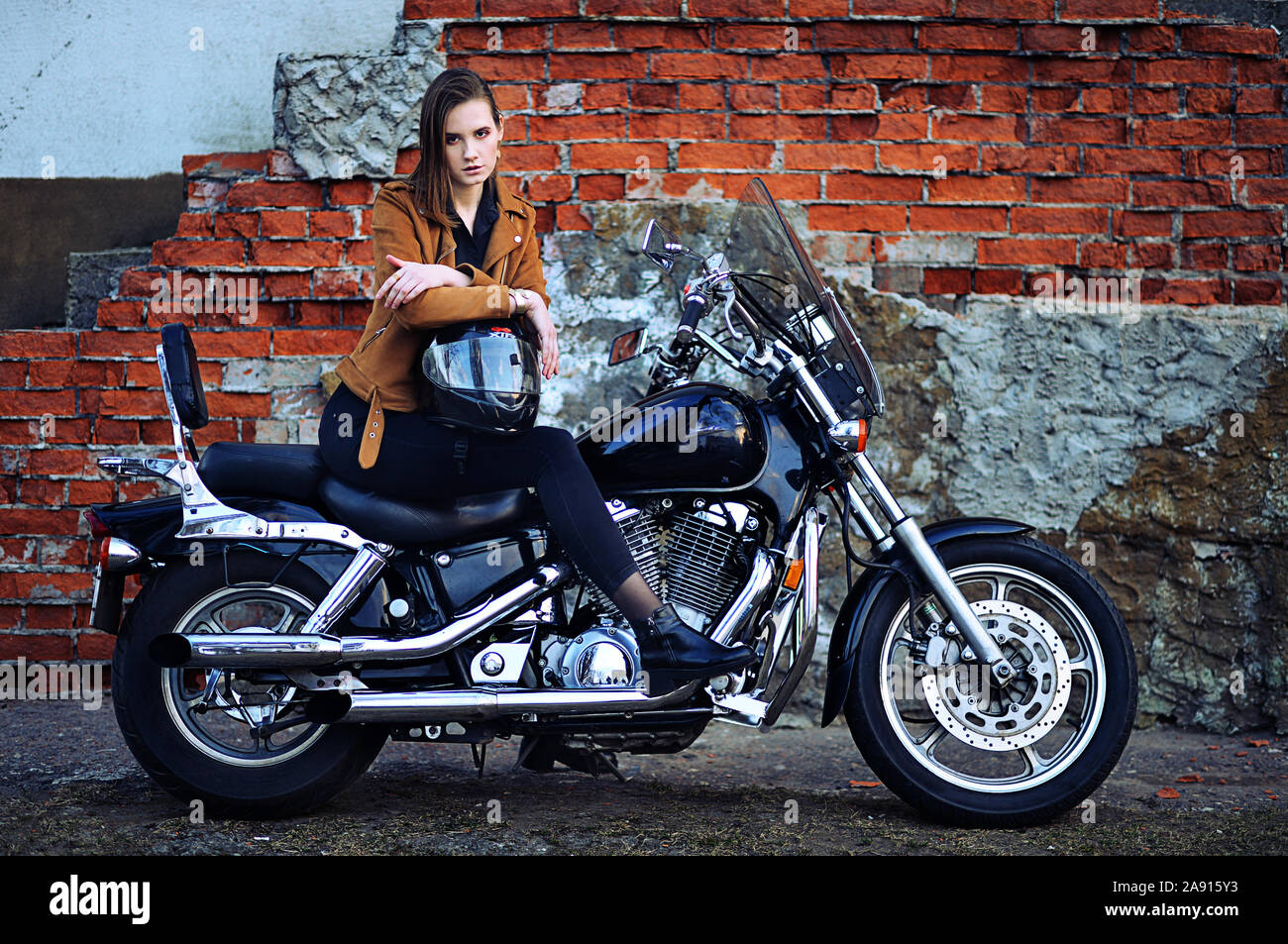 Posing with motorcycle hi-res stock photography and images - Alamy